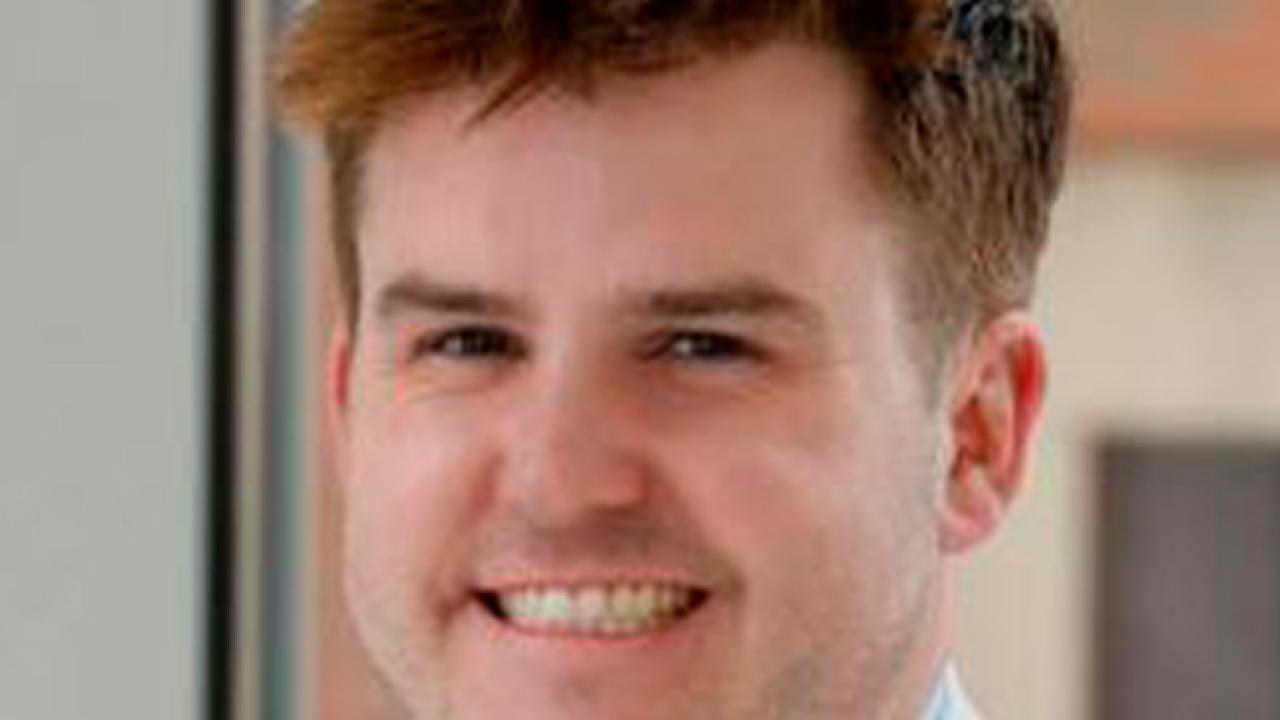 John Loftus, MD (he/him)